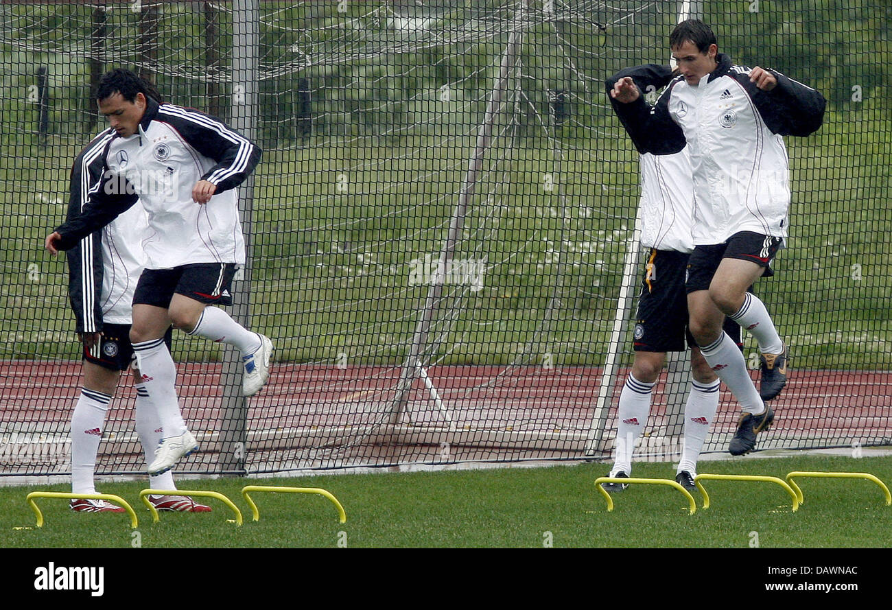 German national team players Piotr Trochowski (L) and Miroslav Klose ...