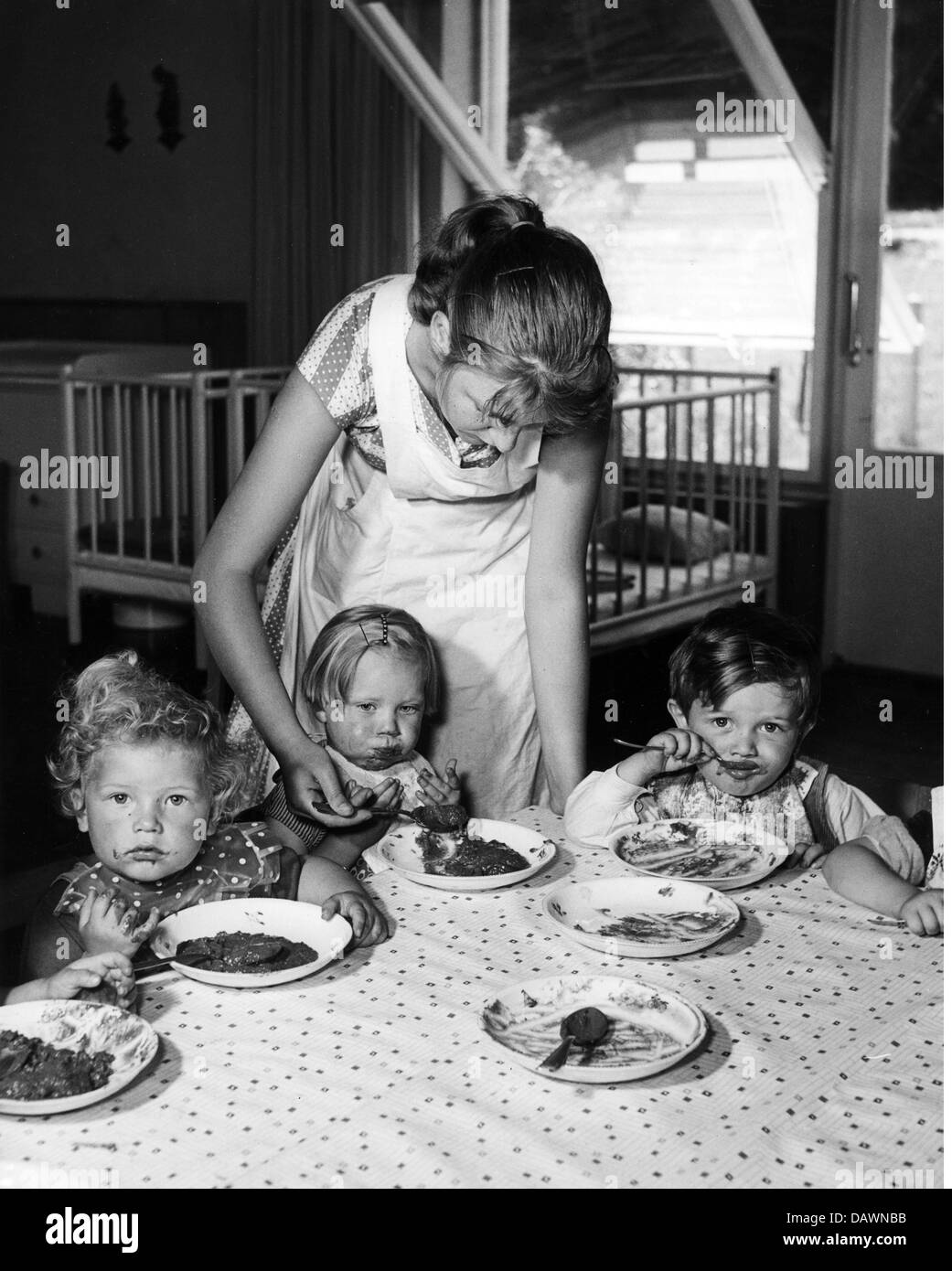 Day care teacher Black and White Stock Photos & Images - Alamy
