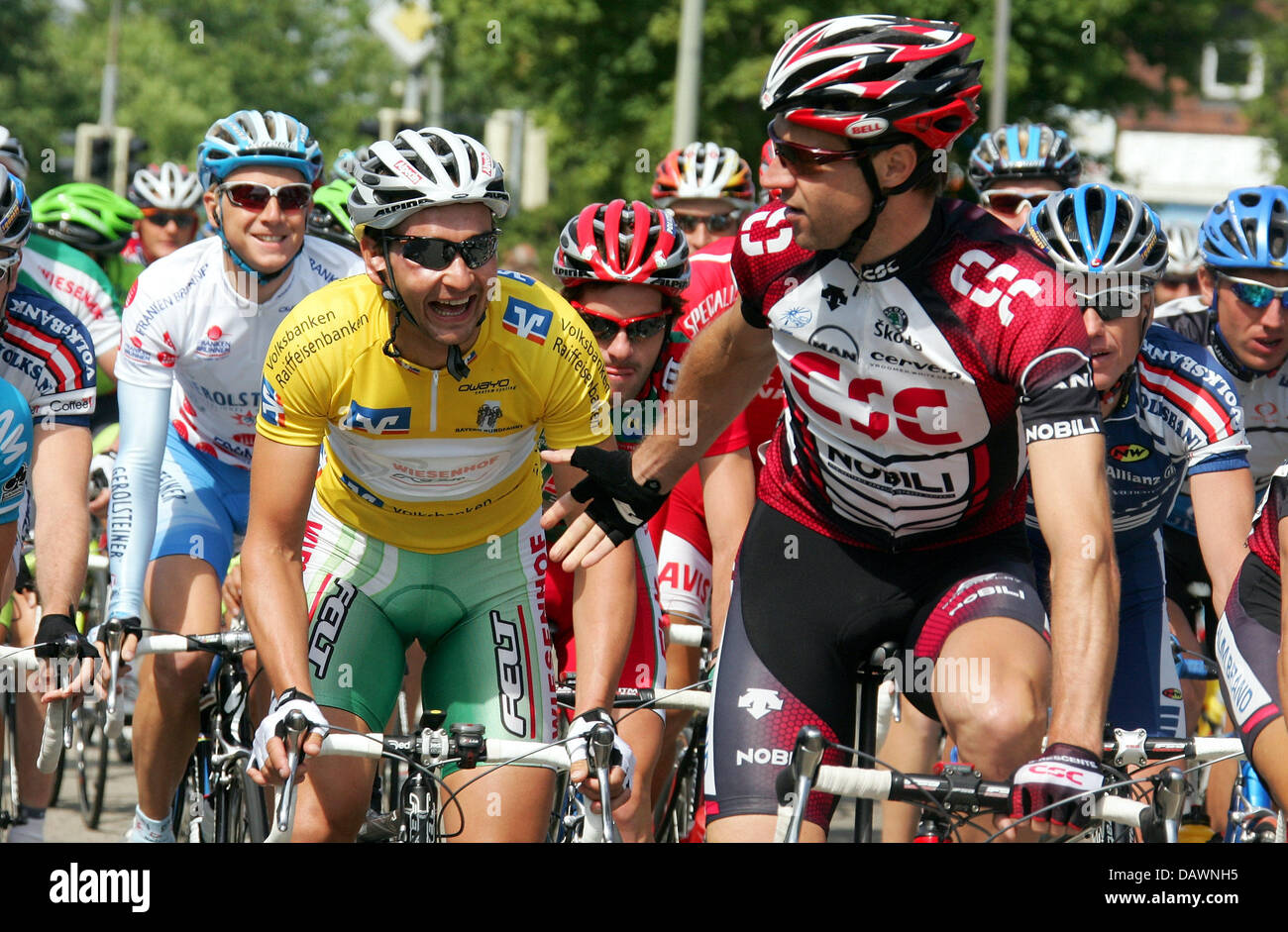 German cyclists Jens Voigt of Team CSC, Andre Schulze of Team Wiesenhof ...