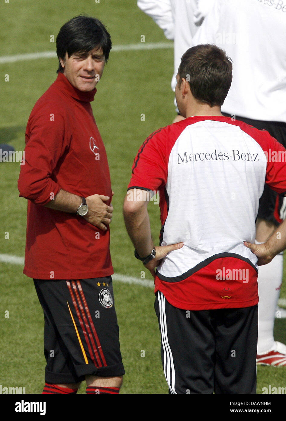 The coach of the German national soccer team Joachim Loew (L) and ...