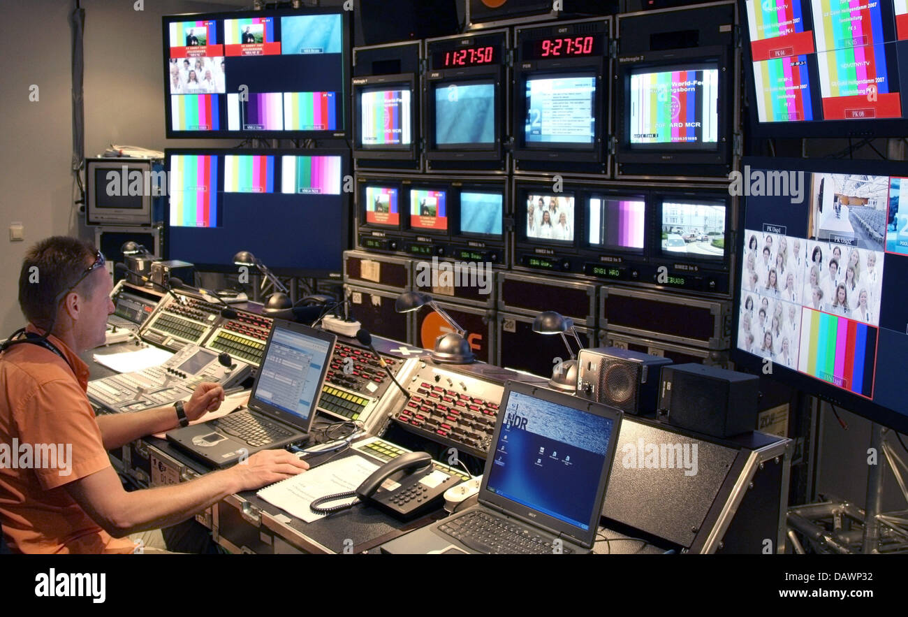 Staff of German TV station ZDF checks the pool image for the worldwide ...