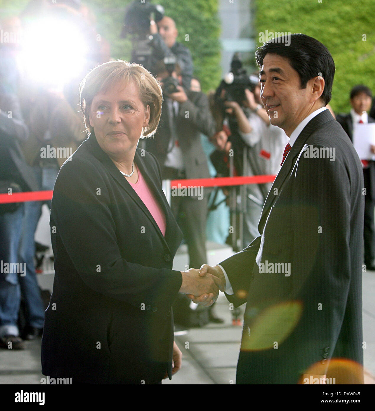 German Chancellor Angela Merkel (R) and the Prime Minister of Japan ...