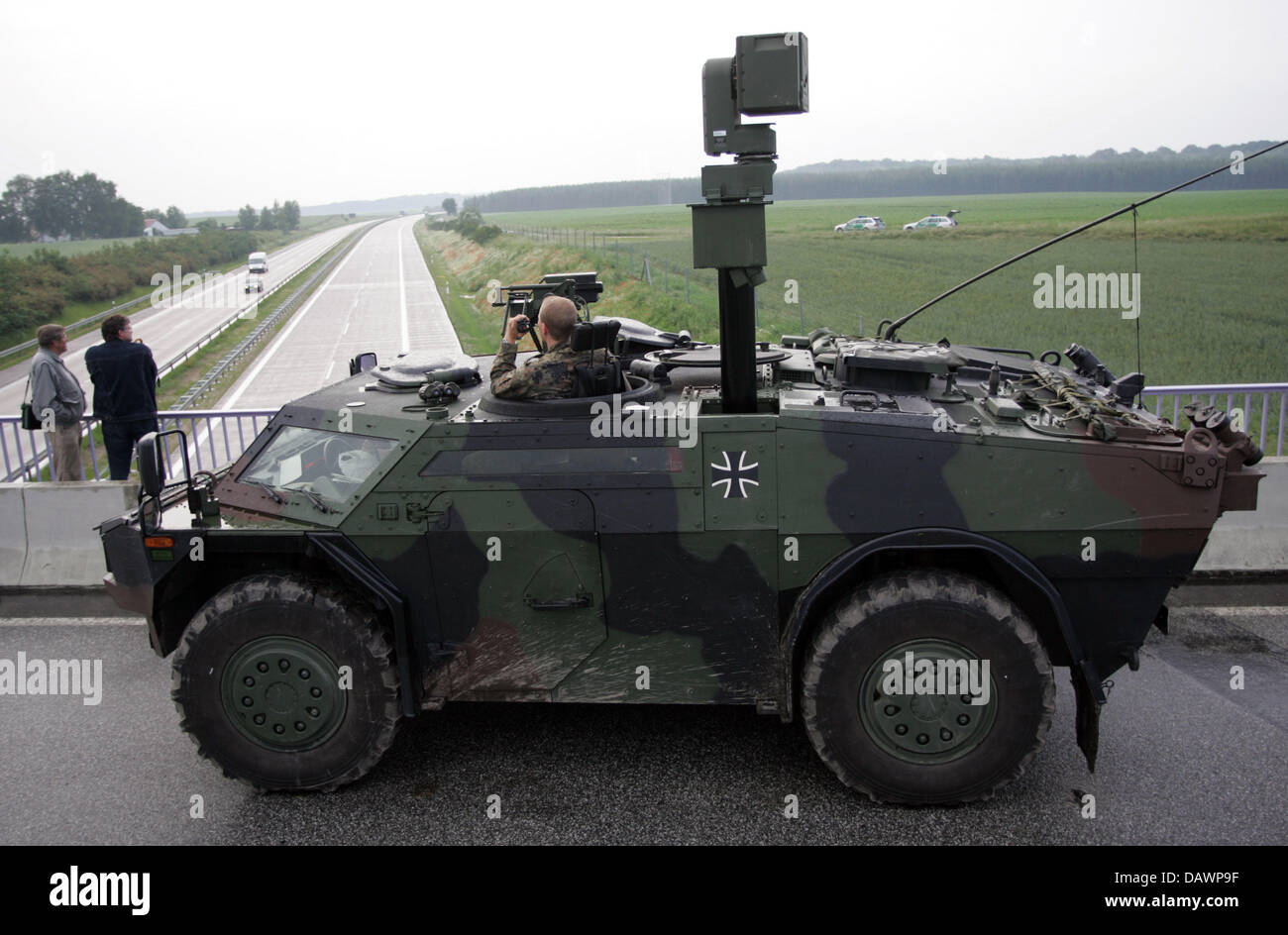 A Bundeswehr scout car secures the airport after the presidential ...