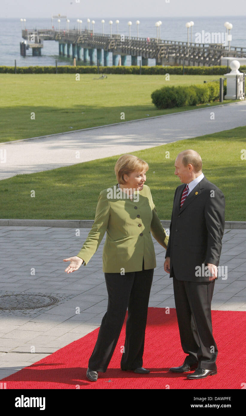 German Chancellor Angela Merkel and the Russian President Vladimir ...