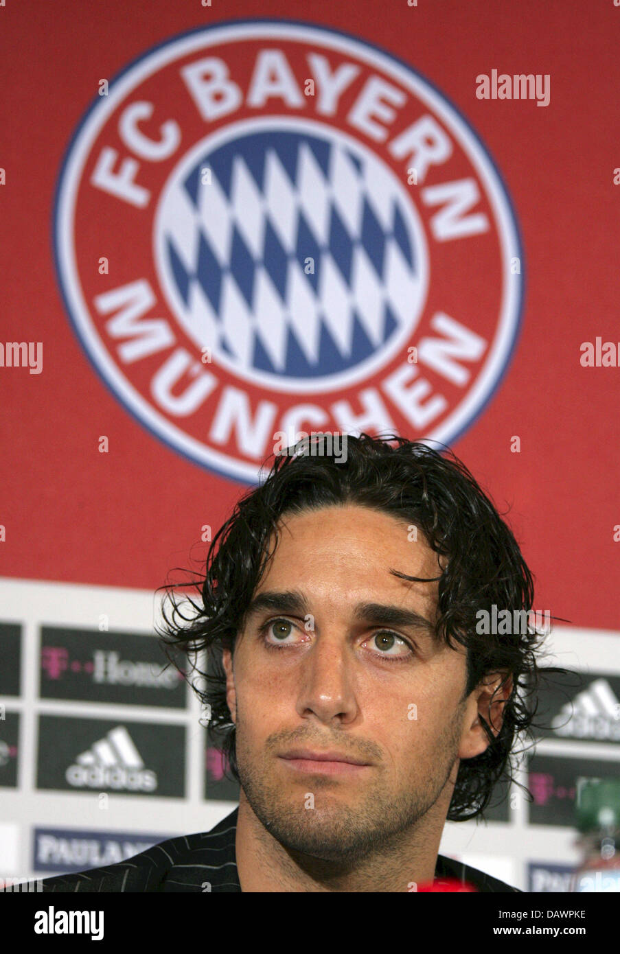 Bundesliga club Bayern Munich's new signed striker Luca Toni smiles at ...