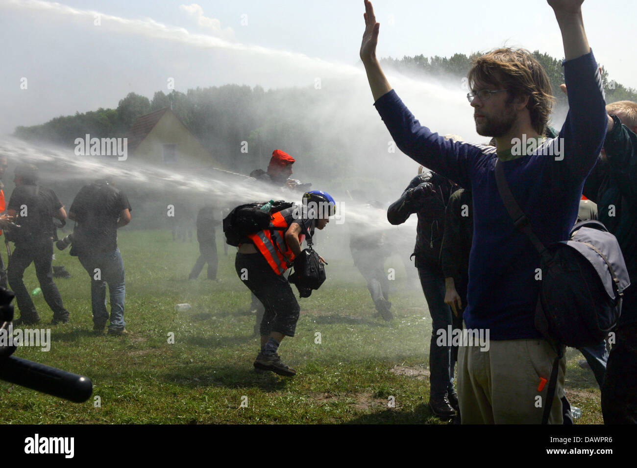 Police forces use water cannon against peaceful demonstrators near ...