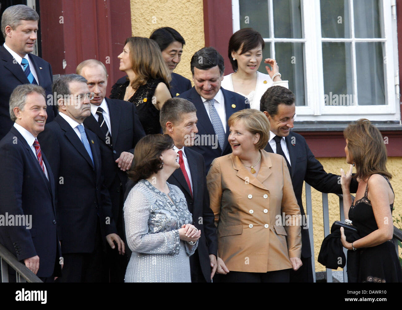 German Chancellor Angela Merkel (front C) and her husband Joachim Sauer ...