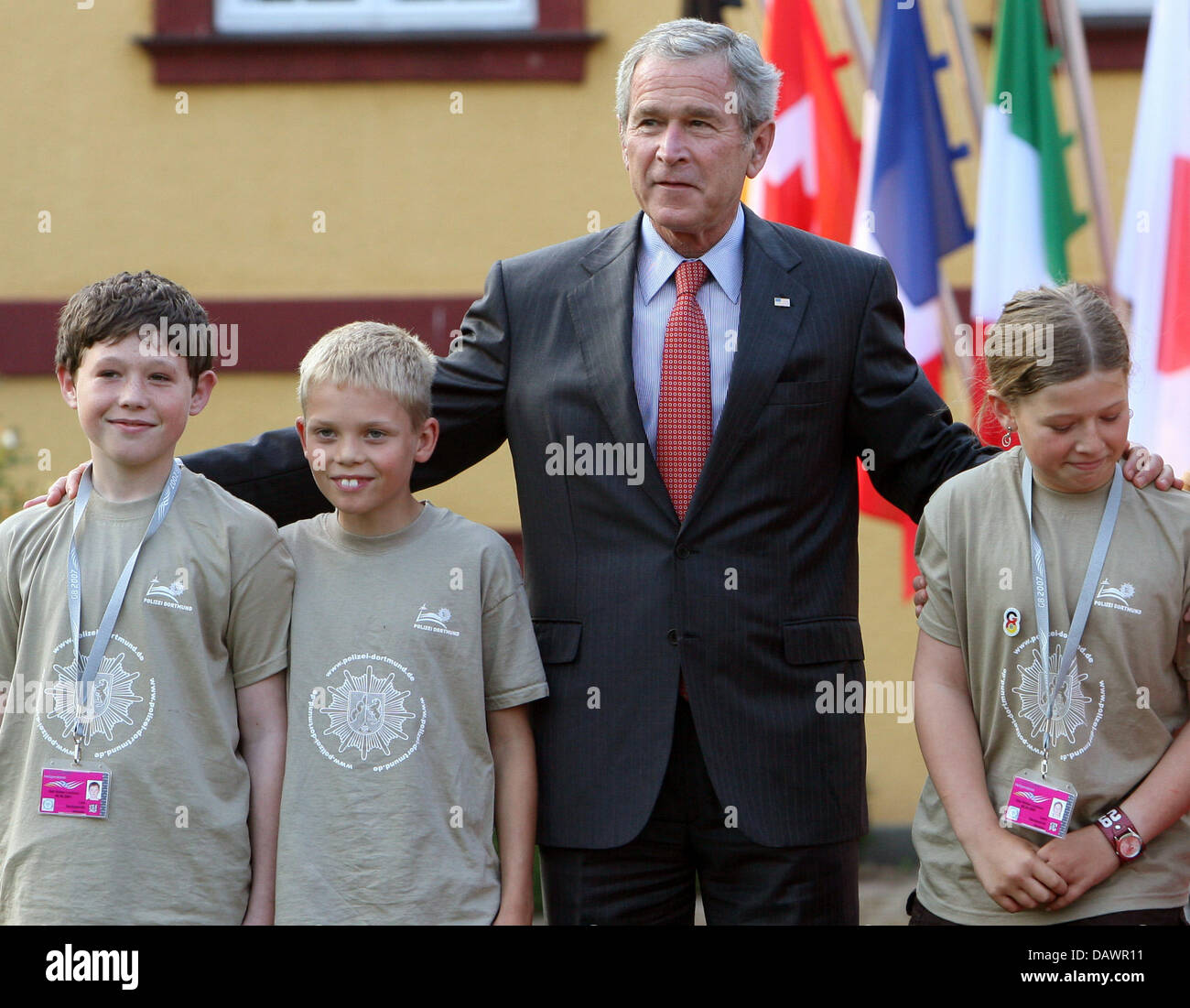 US President George W. Bush poses with children before an informal ...