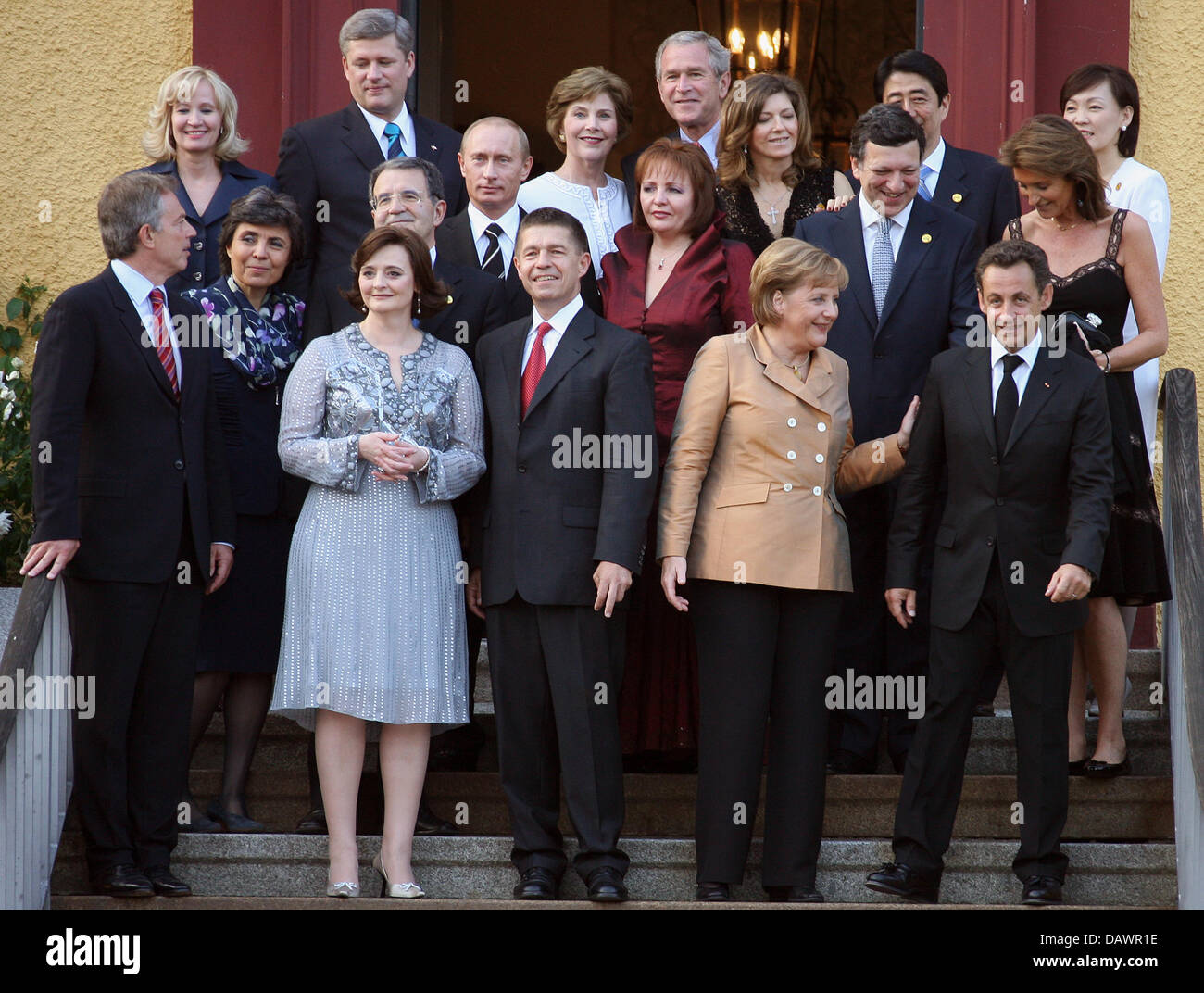 The G8 heads of states and governments line up with their spouses to th ...