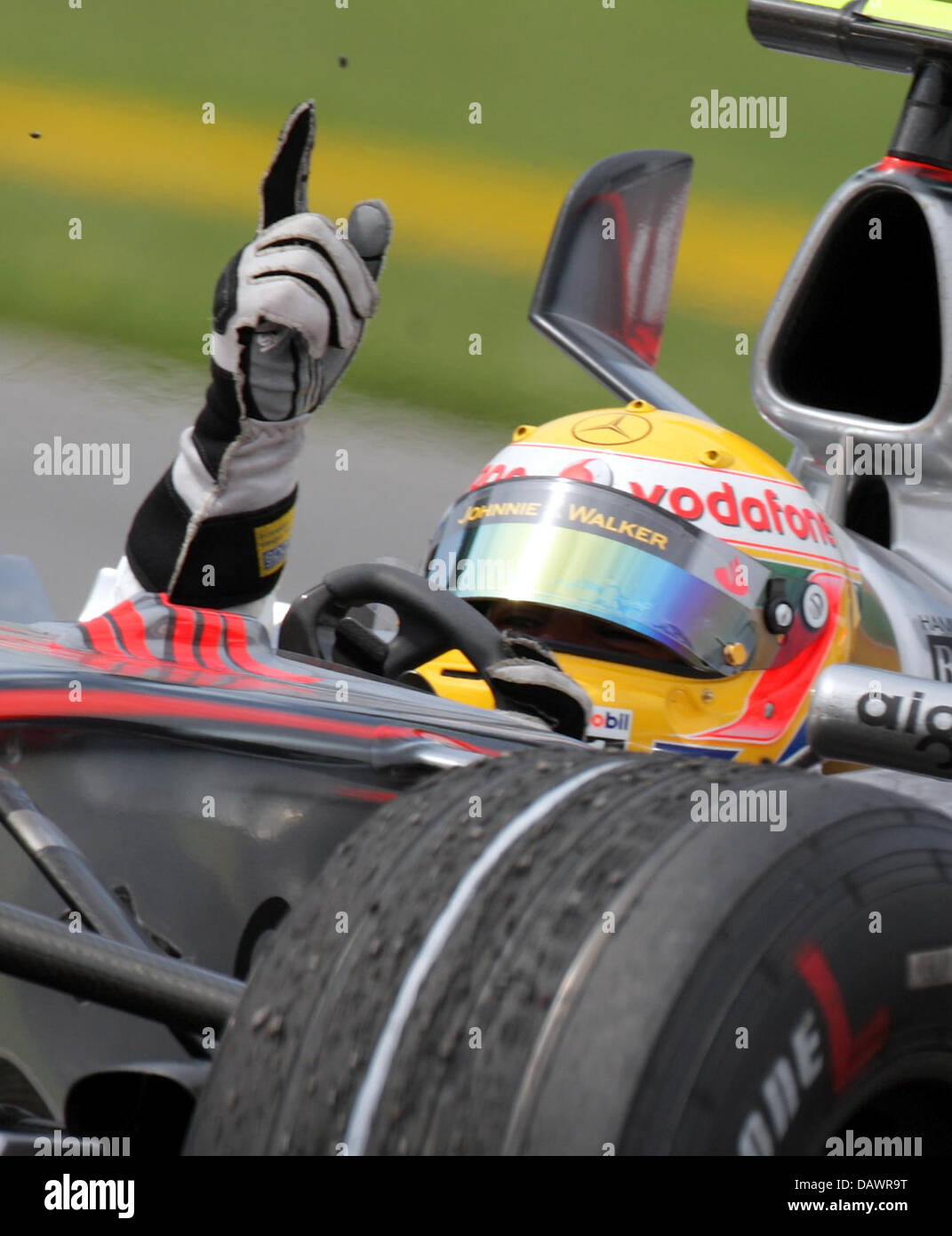 British Formula One rookie Lewis Hamilton of McLaren Mercedes greets ...