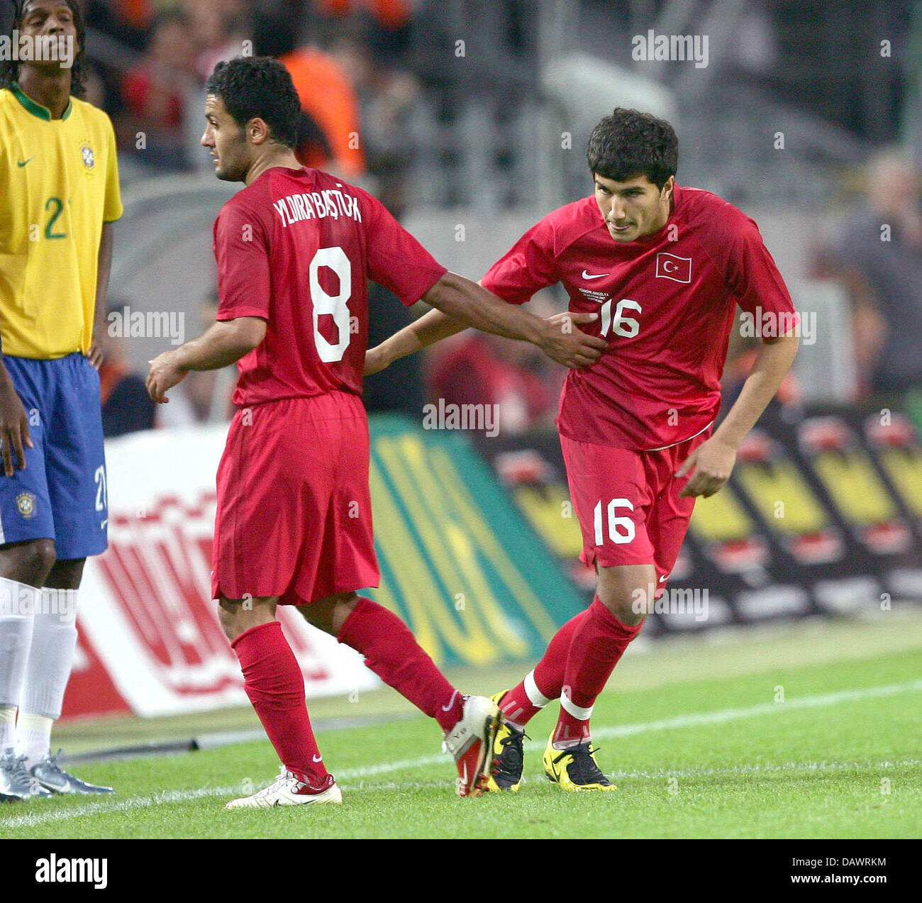 Turkish international Yildiray Bastuerk (C) is substituted by Nuri ...