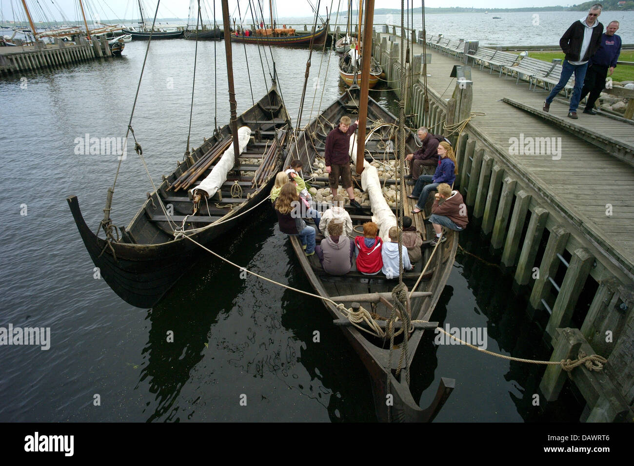 Two reconstructed Viking ships lie in the harbour of the museum for ...