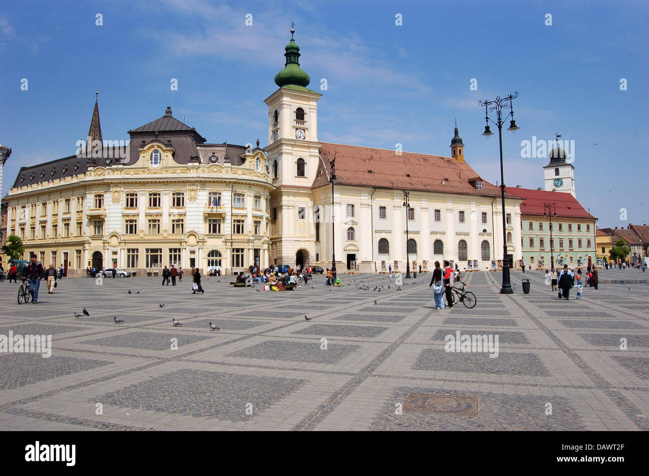 The pictured shows the town house (L) and church (R) of Sibiu, Romania ...