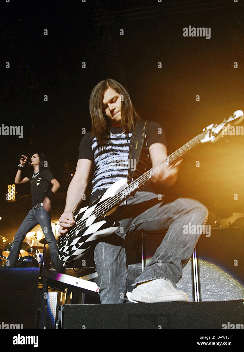 Tokio Hotel bassman Georg Listing poses while playing at his band's ...
