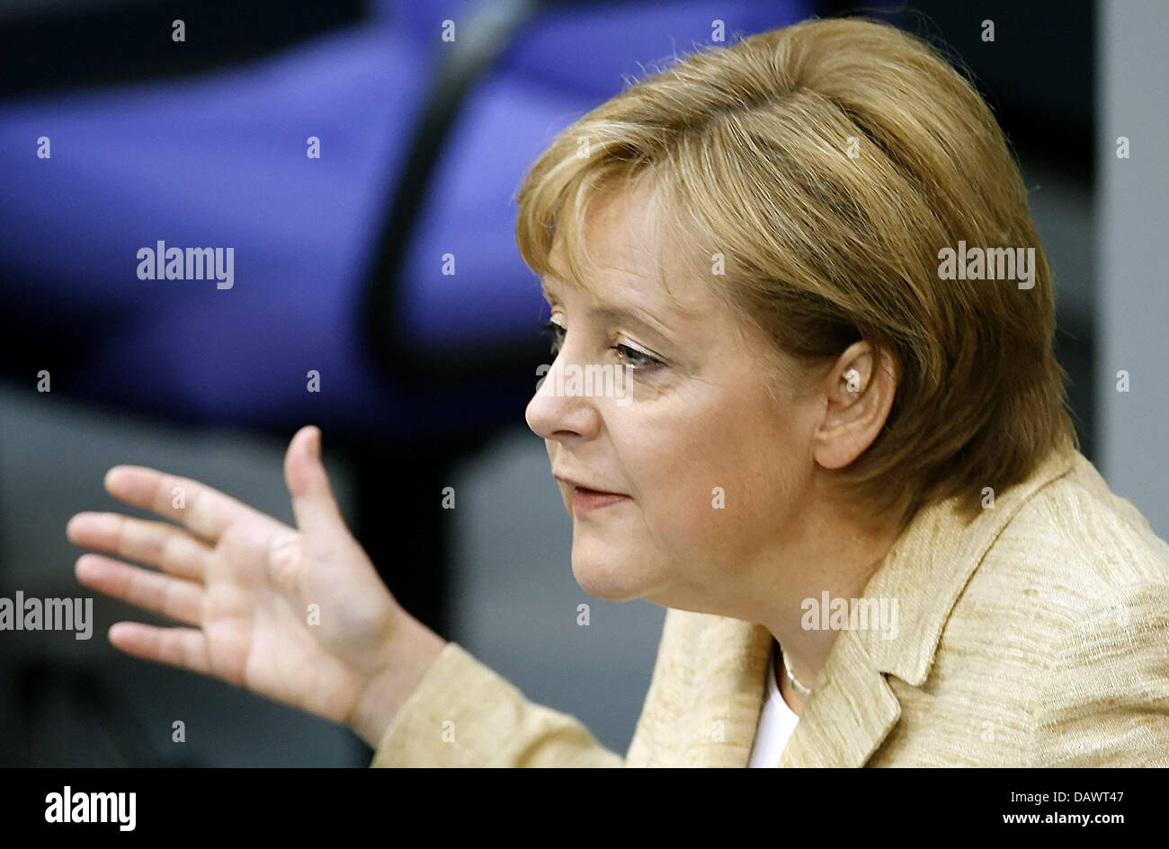 German Chancellor Angela Merkel speaks to the German Bundestag in ...