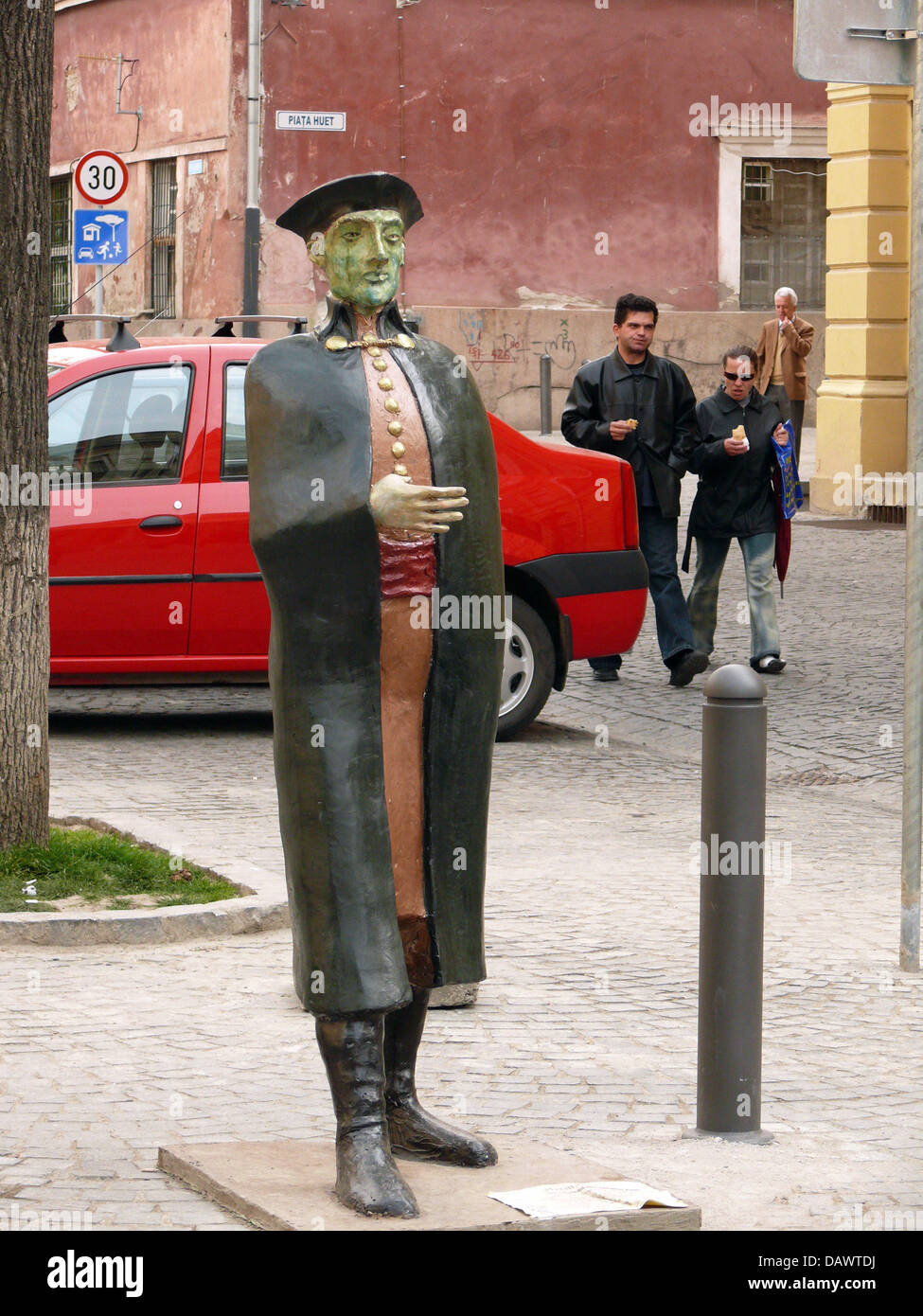 The picture shows live-size statues telling the history of Sibiu ...