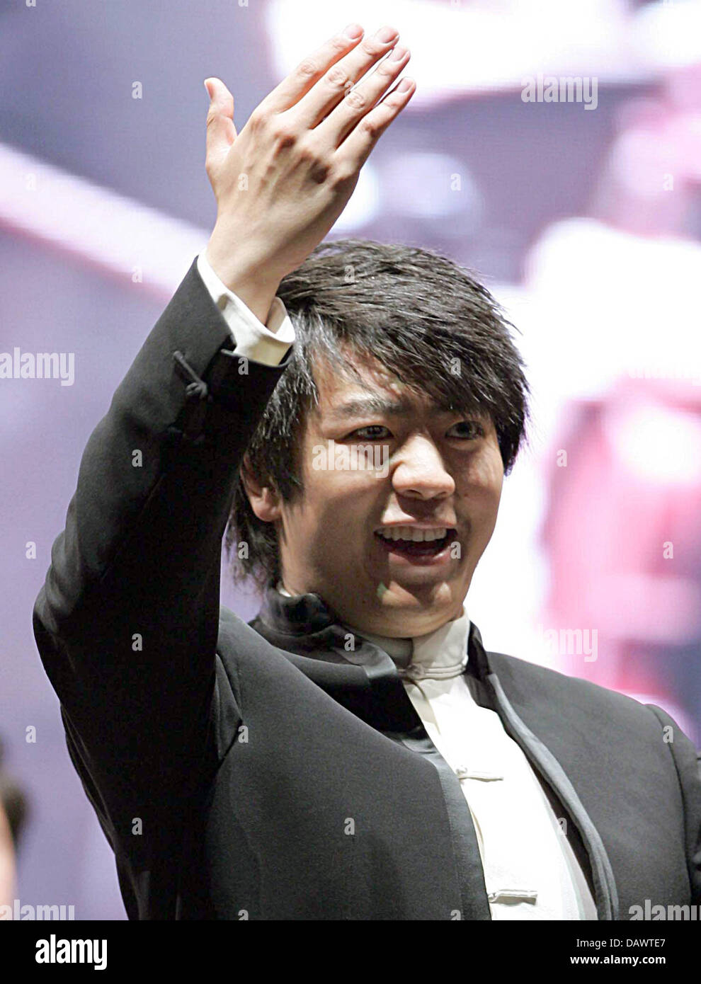 Chinese star pianist Lang Lang cheers to the audience at the kick-off ...