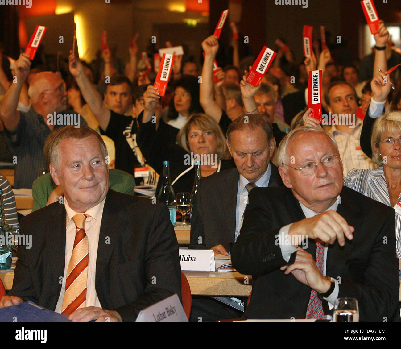 Chair of WASG party Oskar Lafontaine (R) and chair of Democratic ...