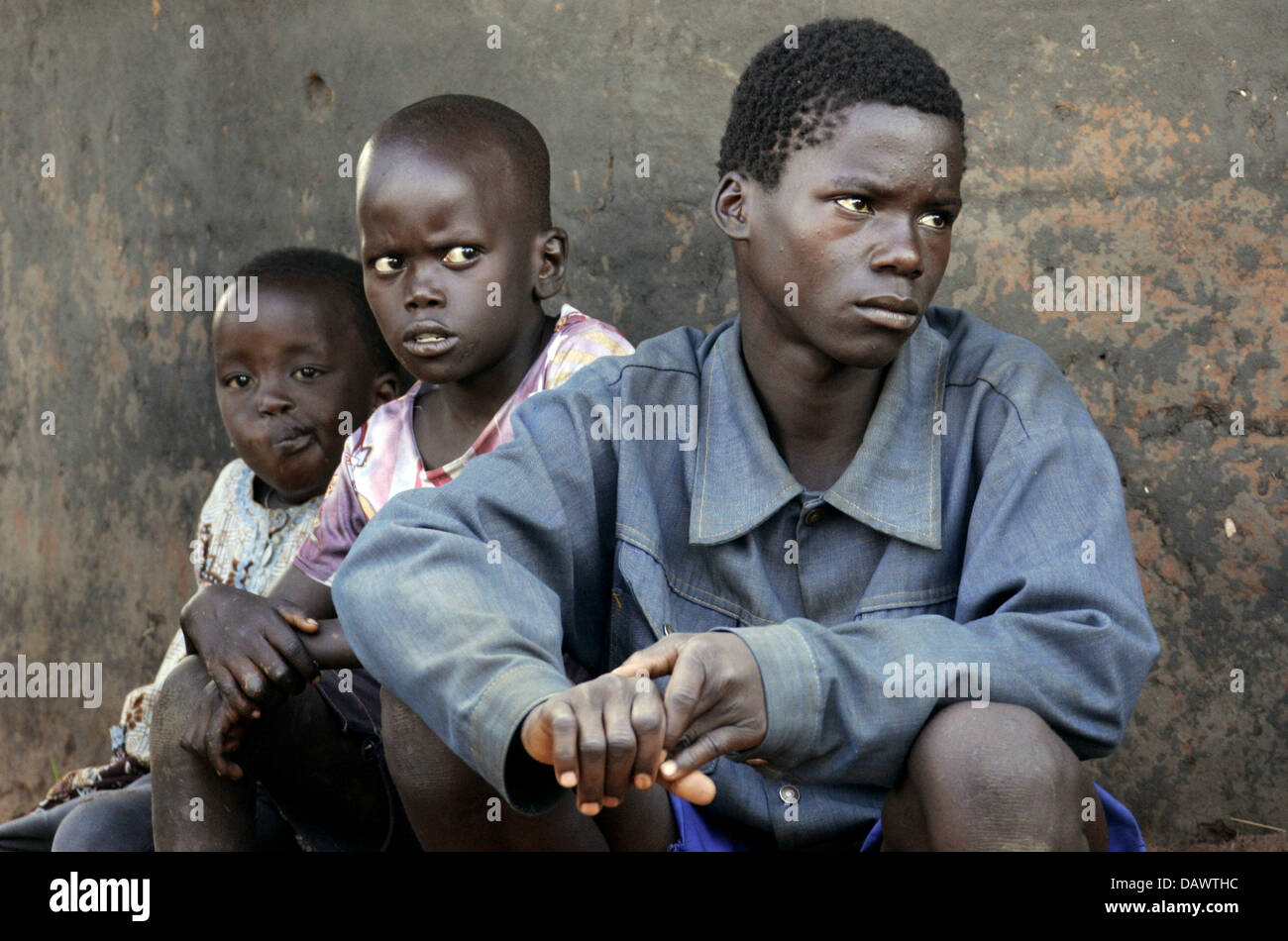 Former child soldier Nelson (R) pictured with two other boys in a ...