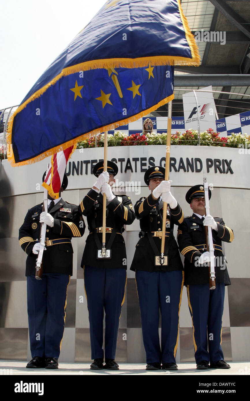 A guard pictured in front of the posium before the start of the Formula ...