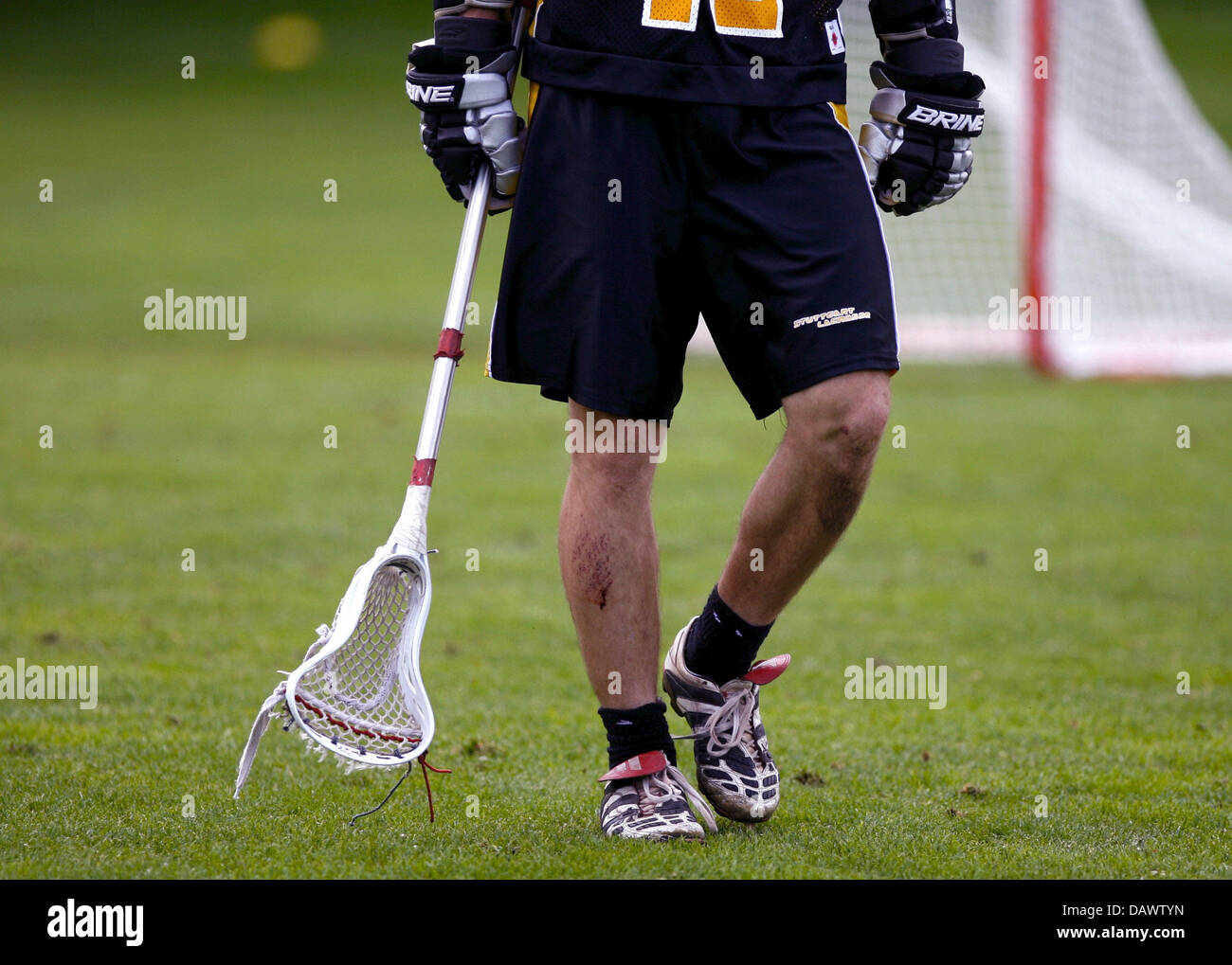 A Lacrosse player holds his crosse at the German Championships in ...