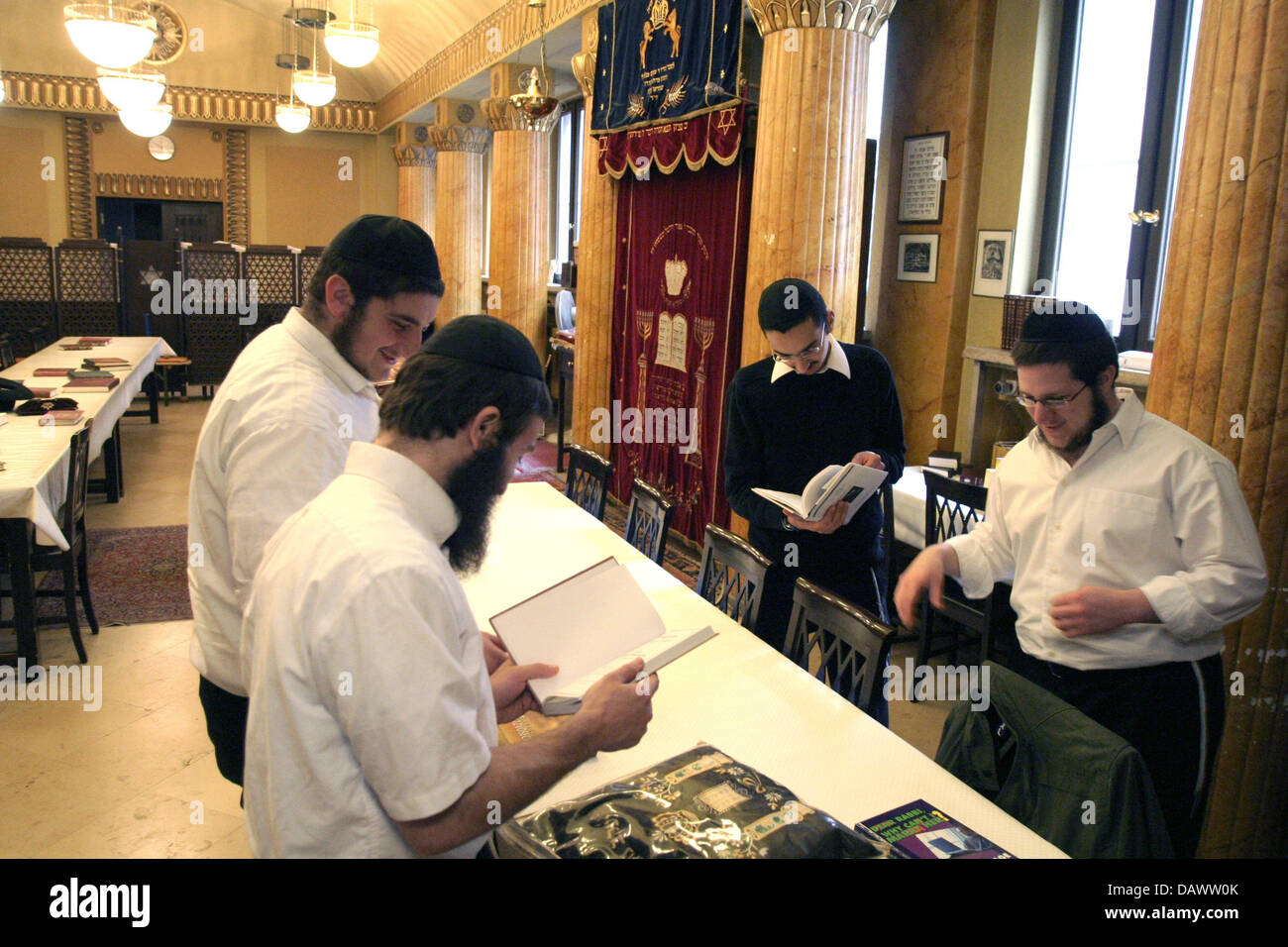 Students studying to become rabbis read at the Jeschiwa Talmud ...