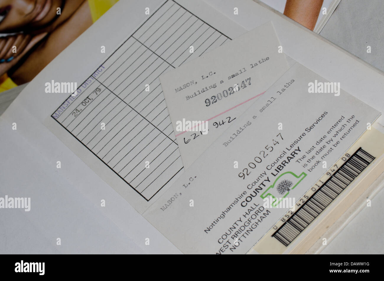 Library book open on the first page with card and pocket showing Stock ...