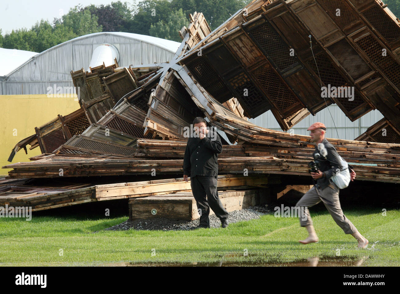 Director of documenta 12, Roger Buergel (L) and curator Ruth Noack walk ...