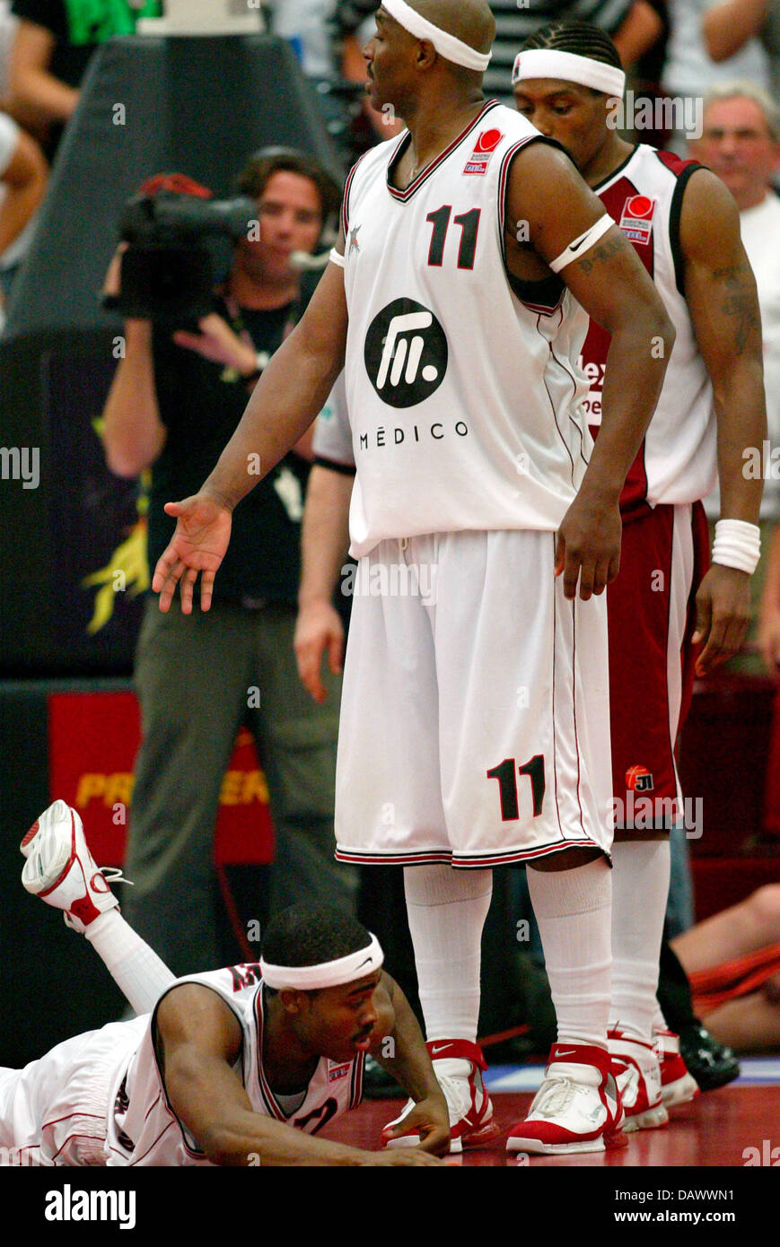 Quakenbrueck's (Artland's) Darius Hall (R) gestures at the sideline ...