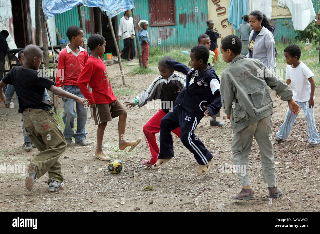 Orphans play football at a project organised by the organisation ...