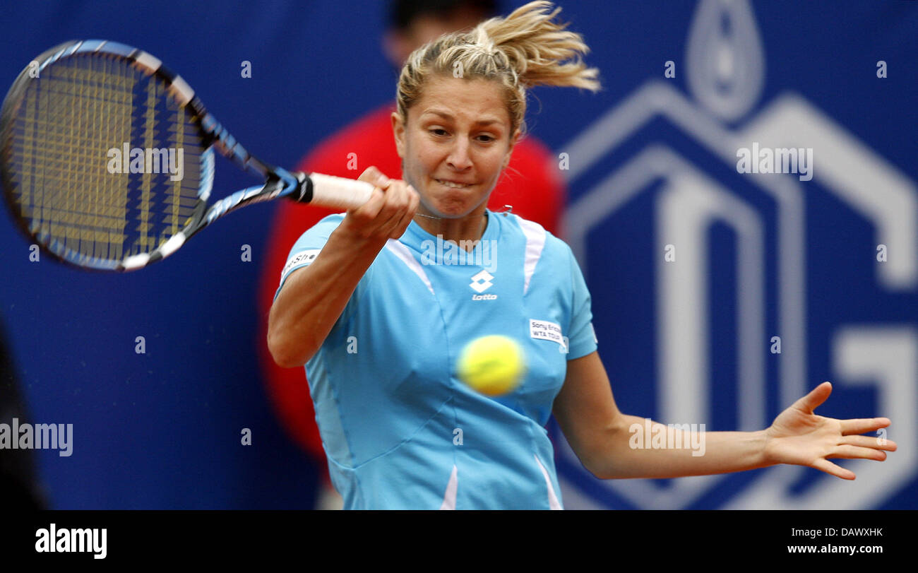 Italian tennis pro Maria Elena Camerin plays a forehand against Belgian ...