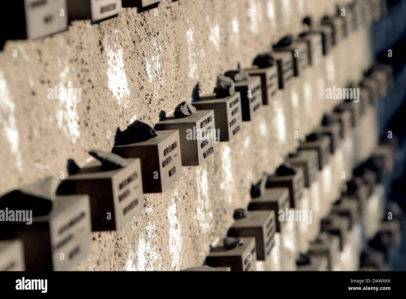 Stones rest on name boards at the memorial for murdered Jews from ...