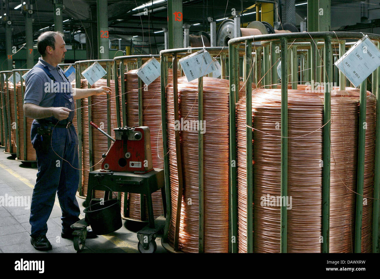 Copper wire spindles wait for furtgher processing at LEONI in Roth ...