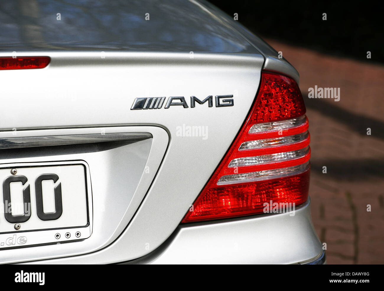 The three magic letters 'AMG' pictured on the rear end of a Mercedes in ...