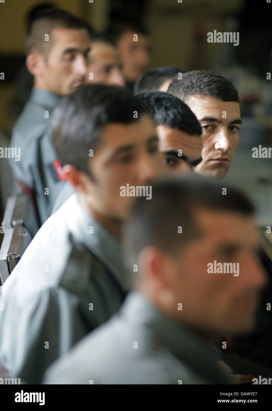 Police students attend class at the police academy headed by the German ...