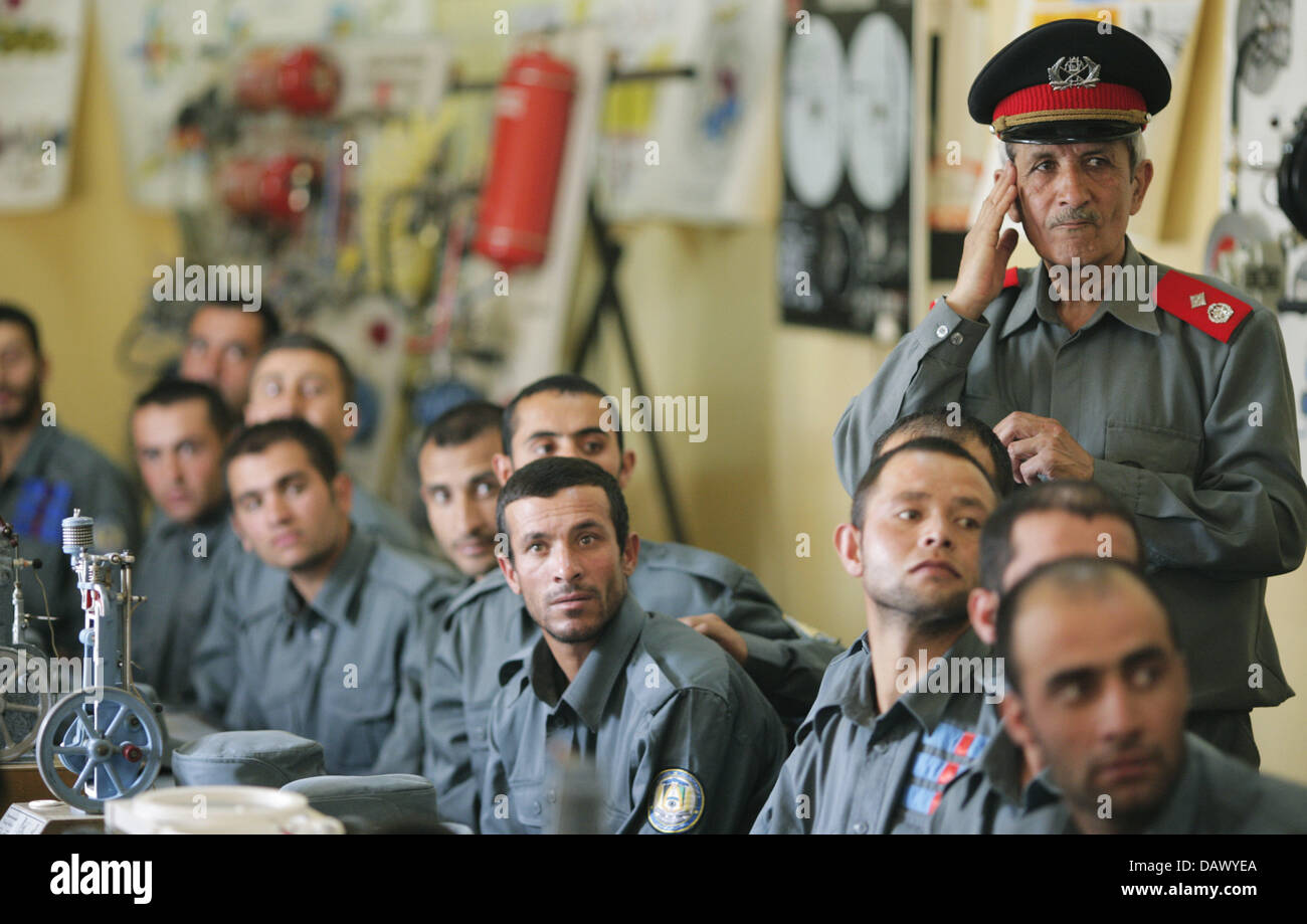 Police students attend class at the police academy headed by the German ...