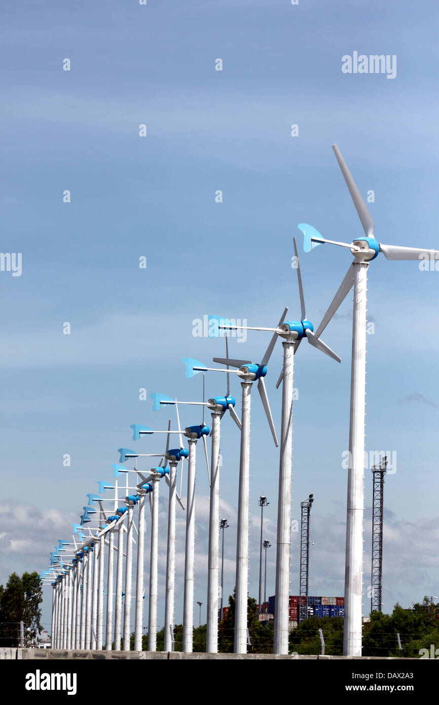 Wind turbines produce electricity for energy and the environment Stock ...
