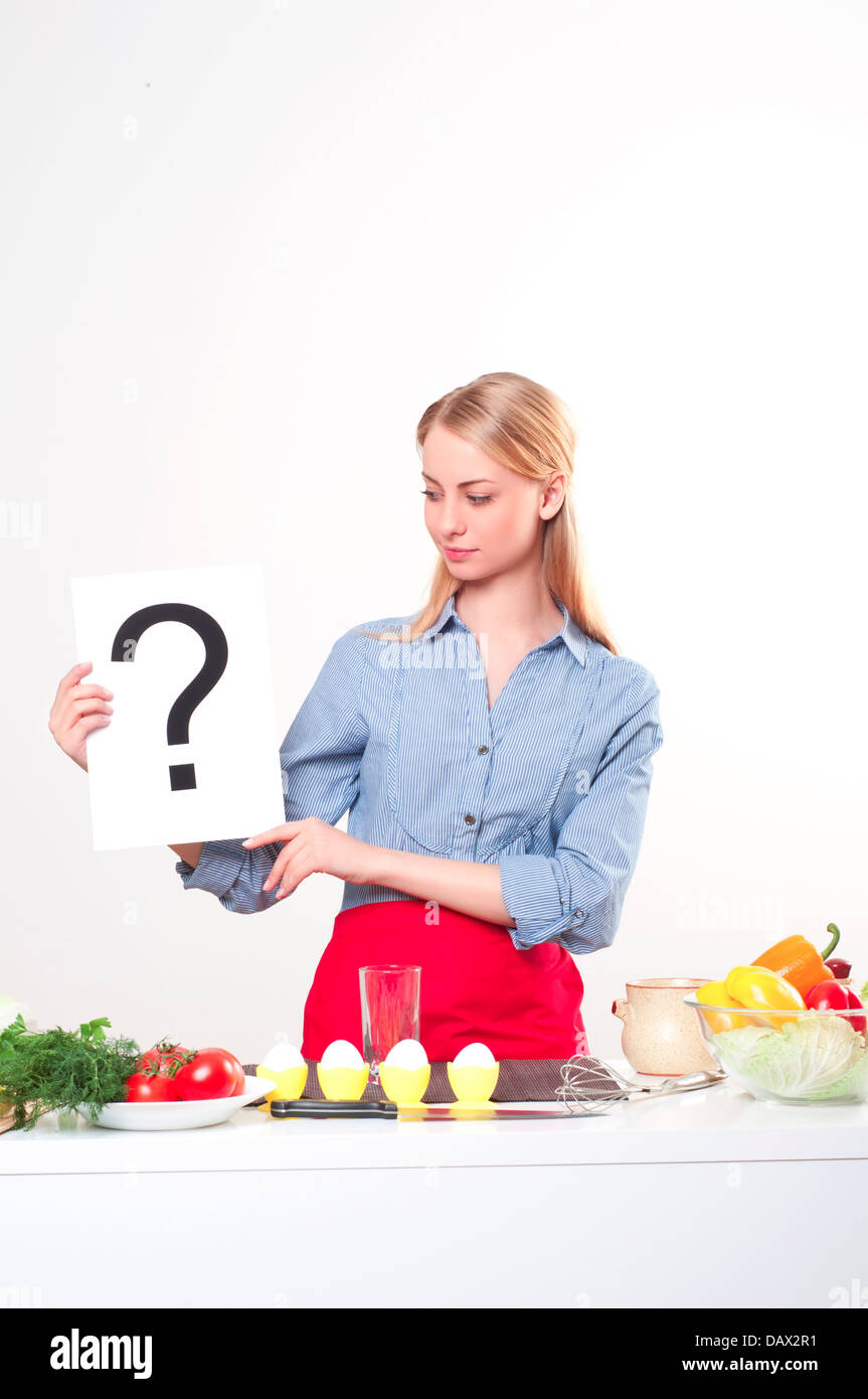 portrait of a young woman, hold question mark Stock Photo - Alamy