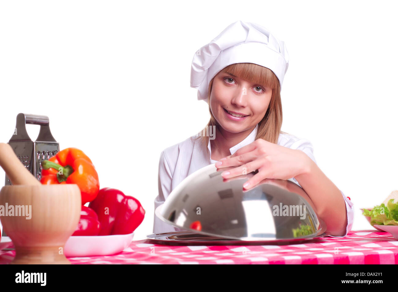Attractive cook woman a over white background Stock Photo - Alamy