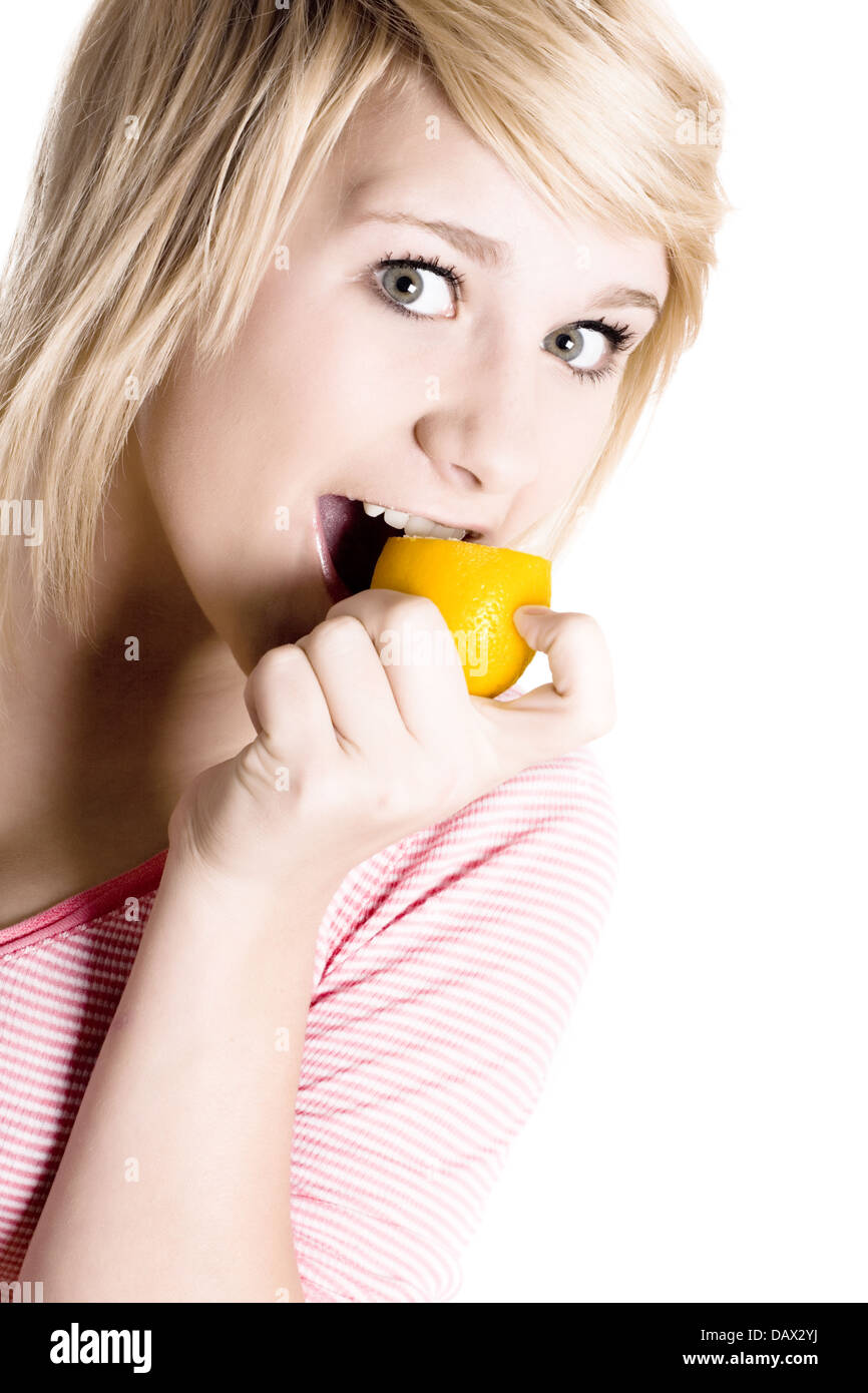 girl eating lemon Stock Photo - Alamy