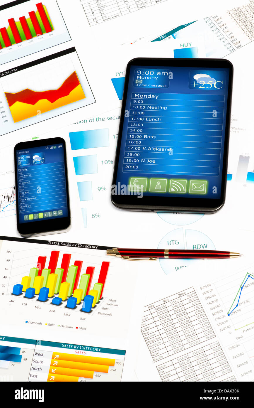 Analyzing financial data mobile phone hi-res stock photography and ...