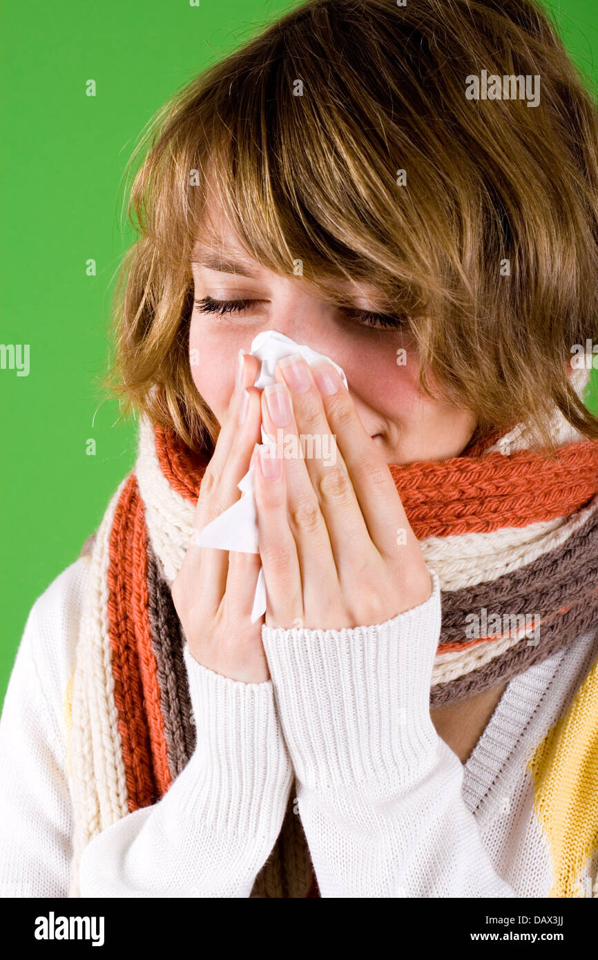 cold girl sneezes Stock Photo - Alamy