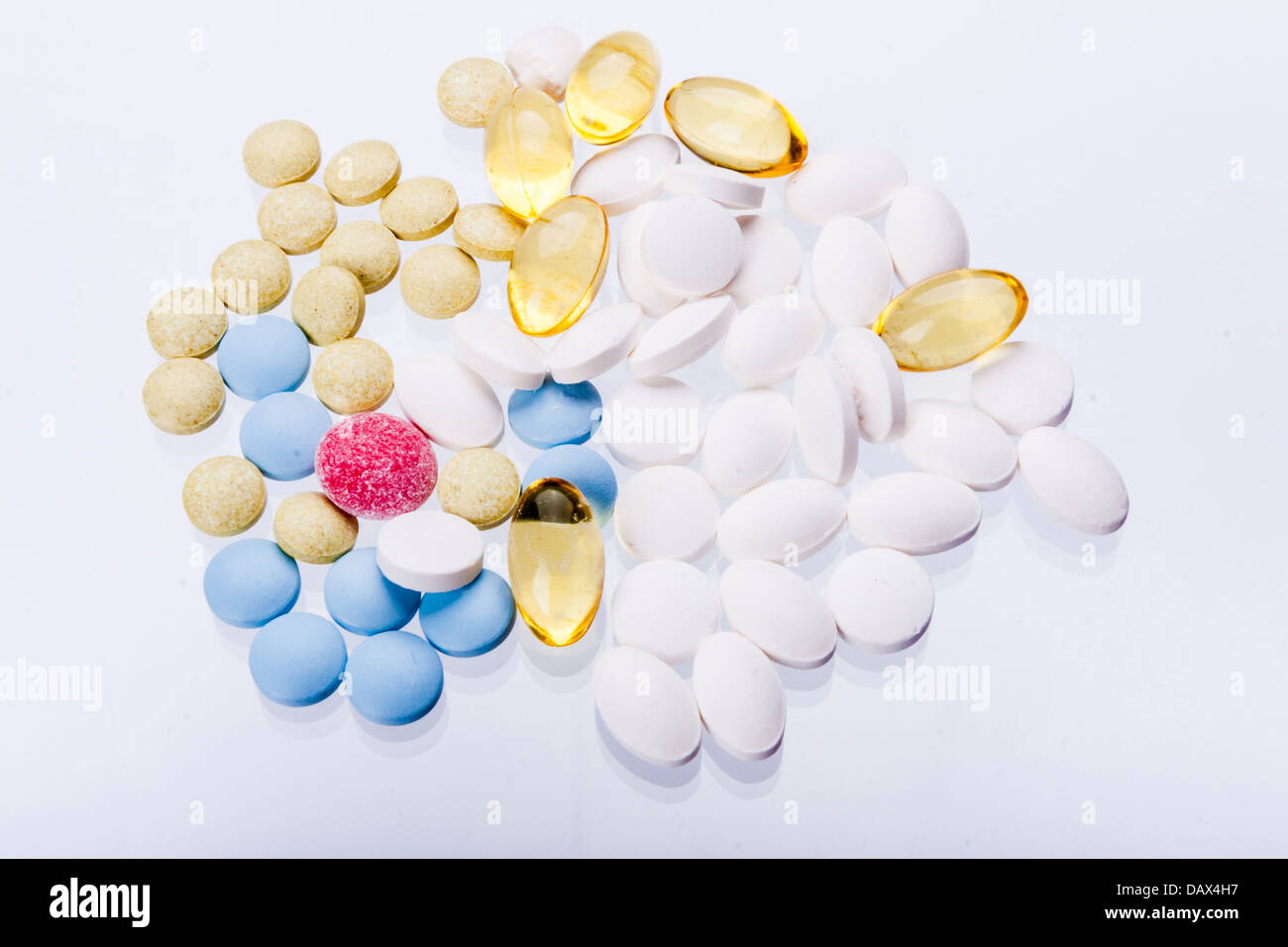 Tablets on white background Stock Photo - Alamy