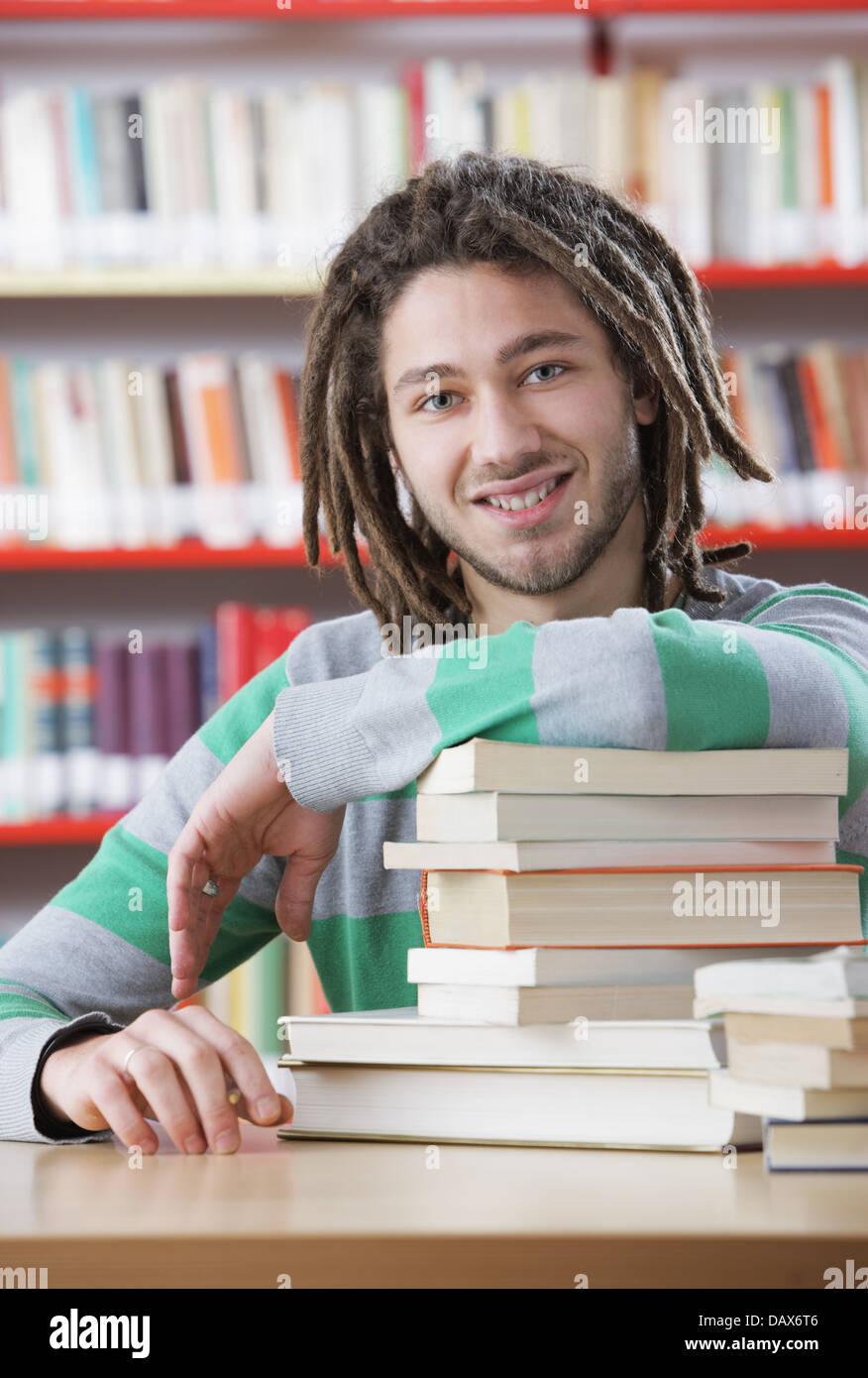 Student in library Stock Photo - Alamy