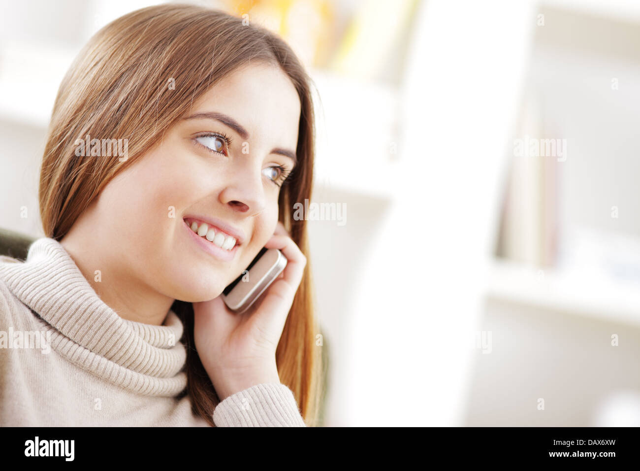 Beautiful girl talking on cell phone Stock Photo - Alamy