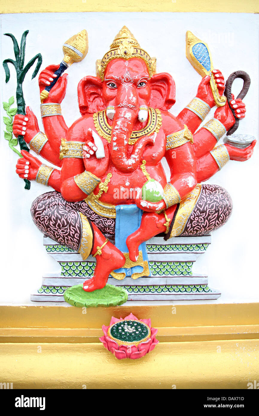 Red Statue Ganesh in temple on the wall Stock Photo - Alamy
