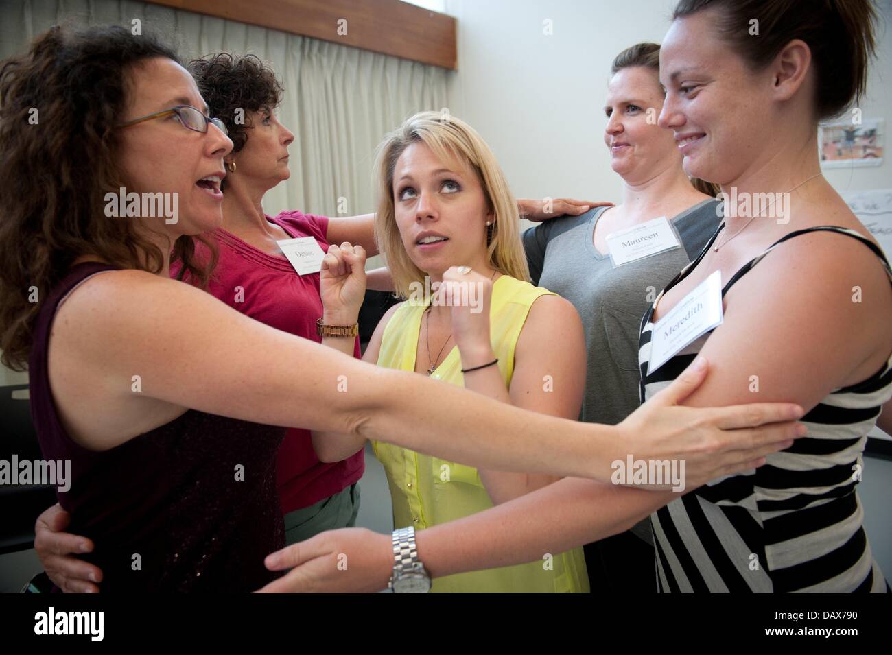 Manhattan, New York, USA. 17th July, 2013. Teachers Jodi Etra, Denise ...