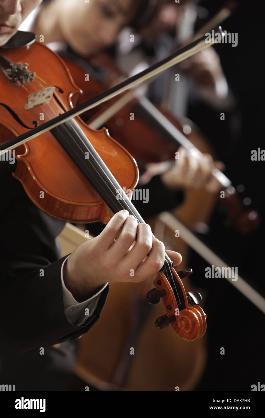 Classical music. Violinists in concert Stock Photo - Alamy