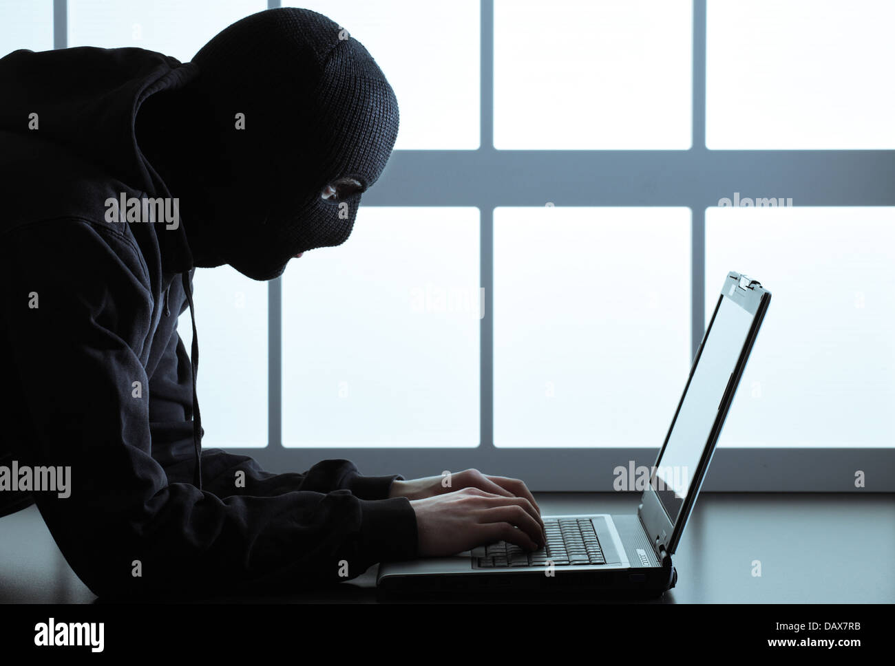 Hacker stealing data Stock Photo - Alamy