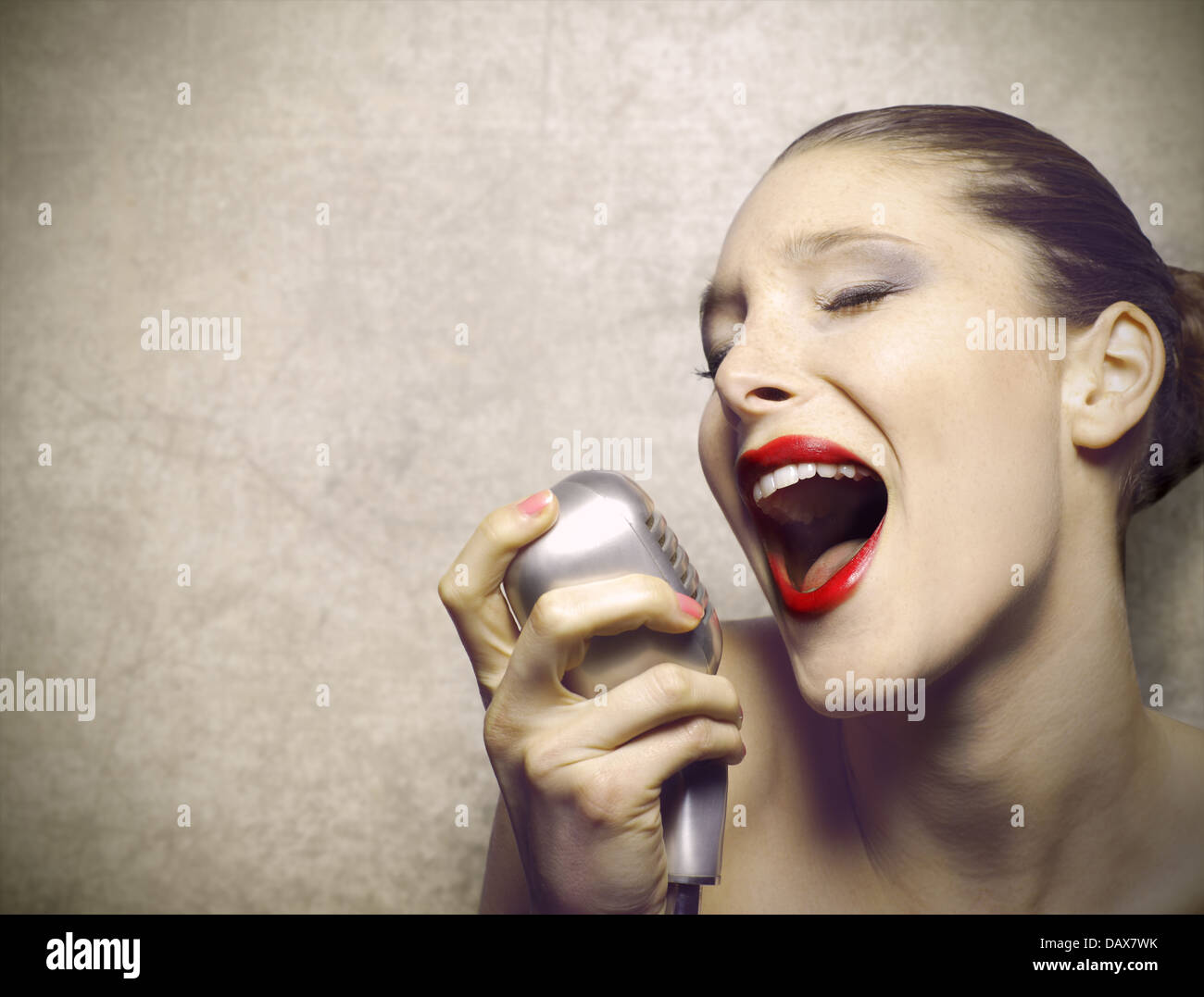 Performance of a beautiful woman singer Stock Photo - Alamy